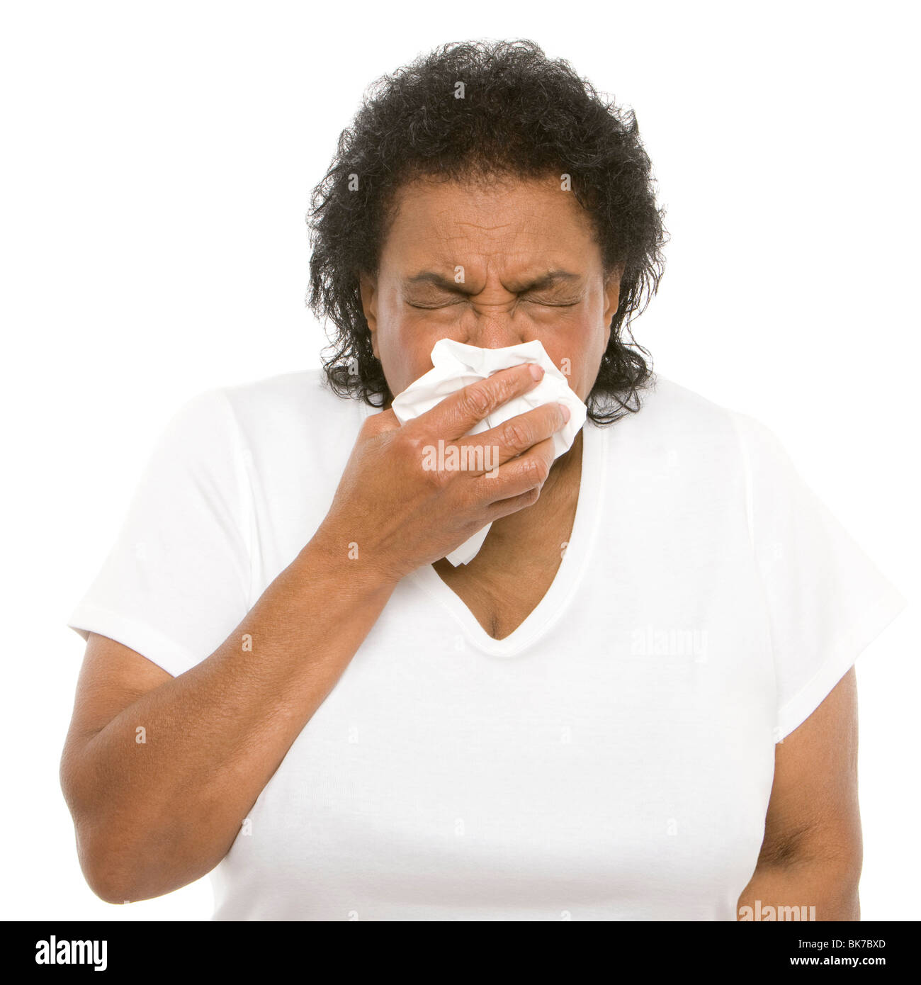 Senior woman sneezing Stock Photo - Alamy