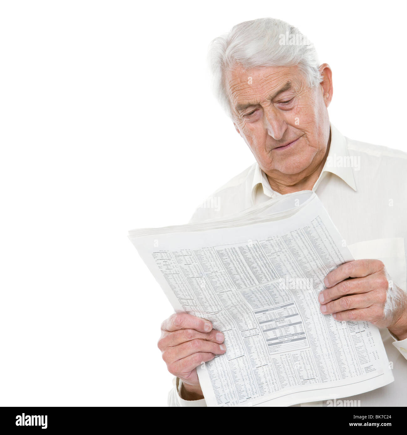 Reading the newspaper Stock Photo - Alamy