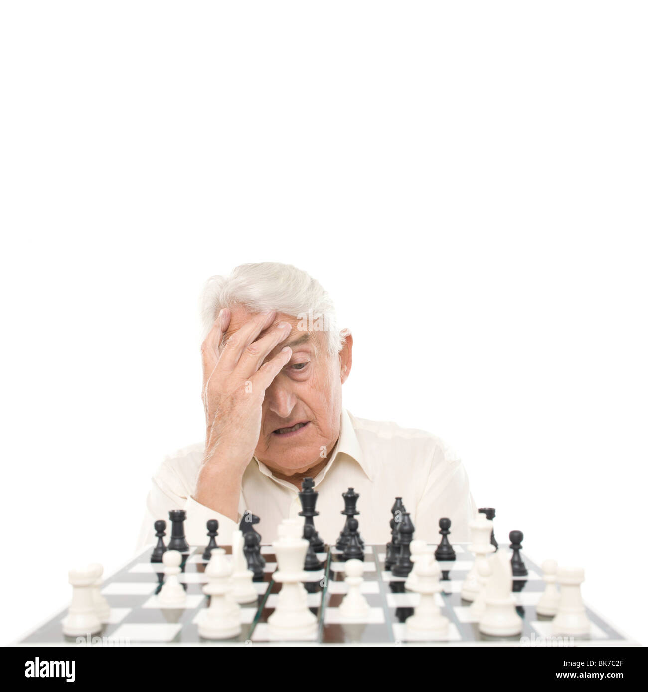 Senior man playing chess Stock Photo - Alamy