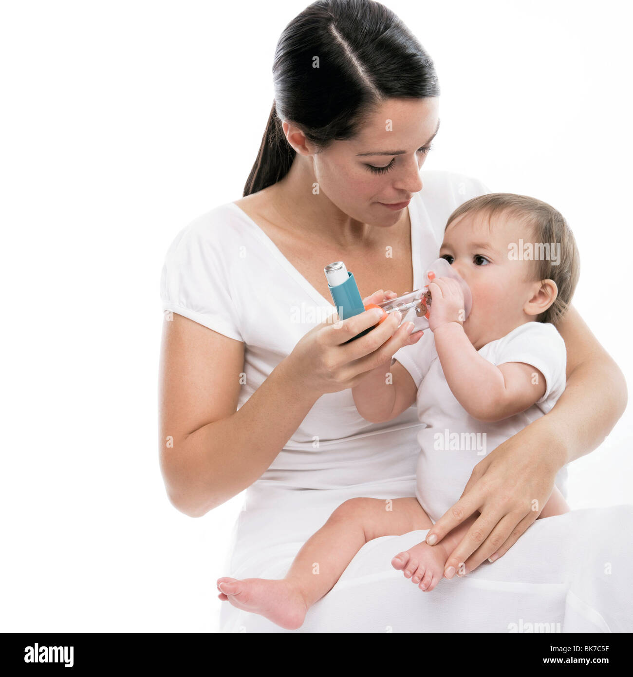 Child using inhaler and spacer hi-res stock photography and images - Alamy