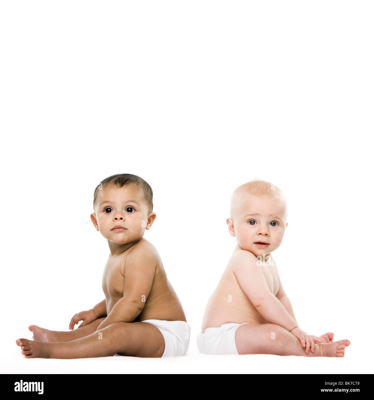 Boy girl sitting back back Cut Out Stock Images & Pictures - Alamy