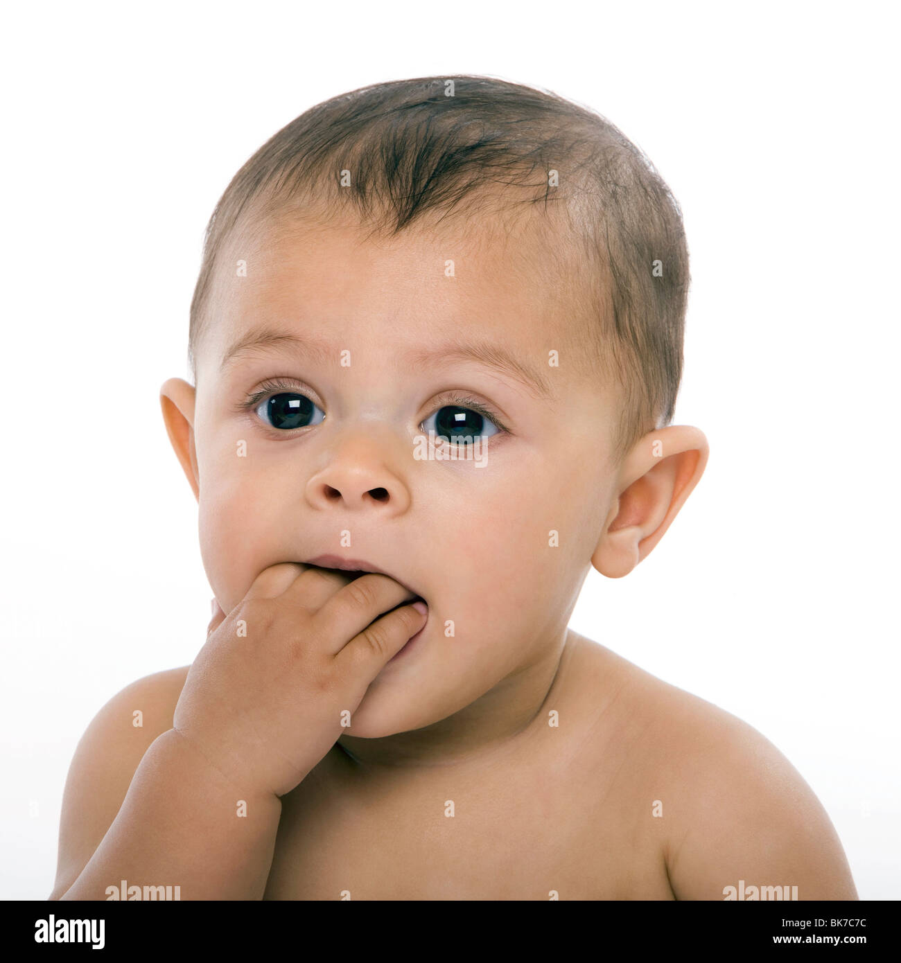 Teething baby girl Stock Photo - Alamy