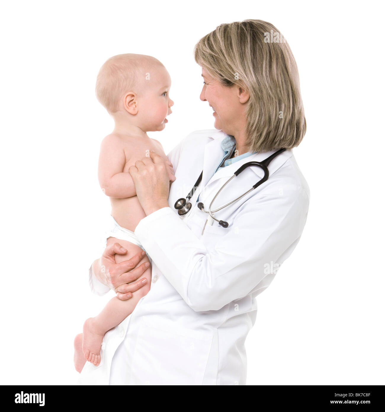 Smiling doctor holding two Cut Out Stock Images & Pictures - Alamy