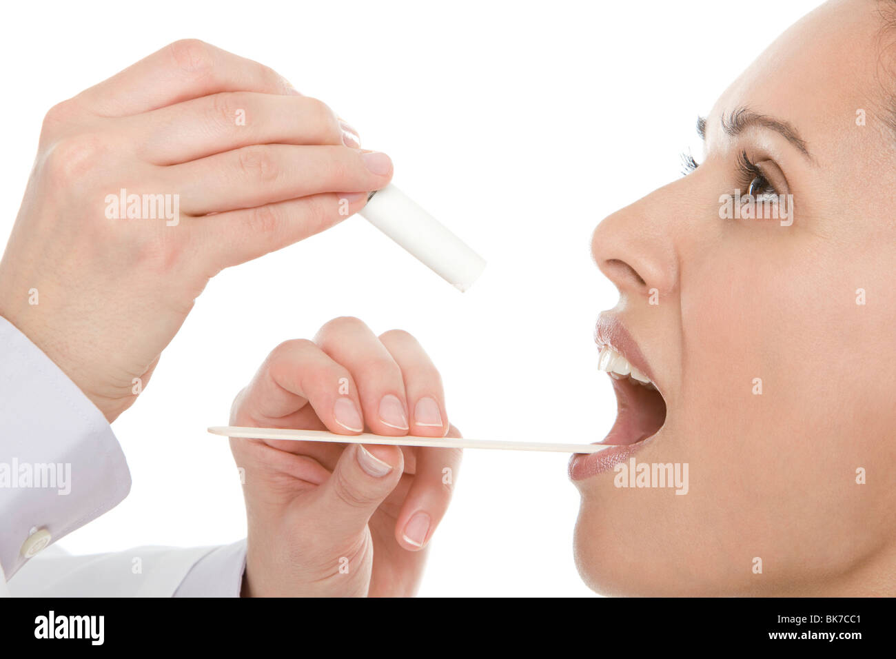 Doctor checking patients throat hi-res stock photography and images - Alamy
