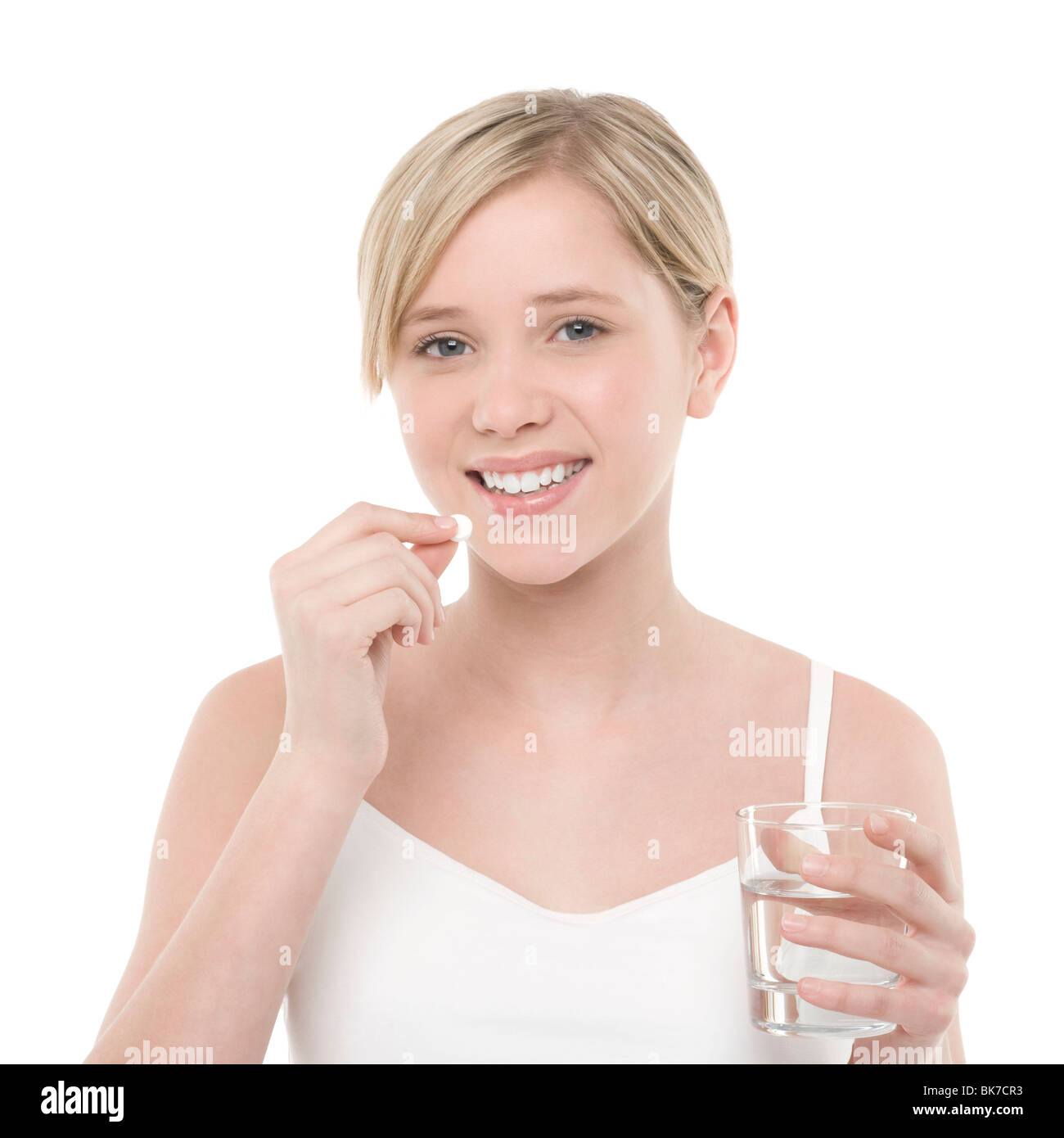 Taking a pill Stock Photo - Alamy