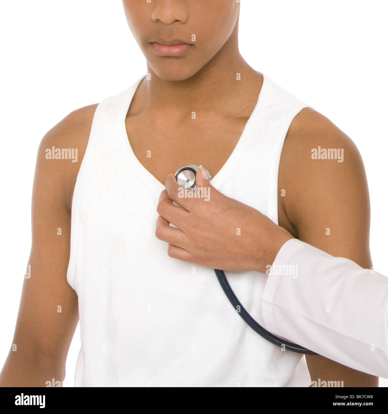 Doctor listening boys chest stethoscope hi-res stock photography and ...