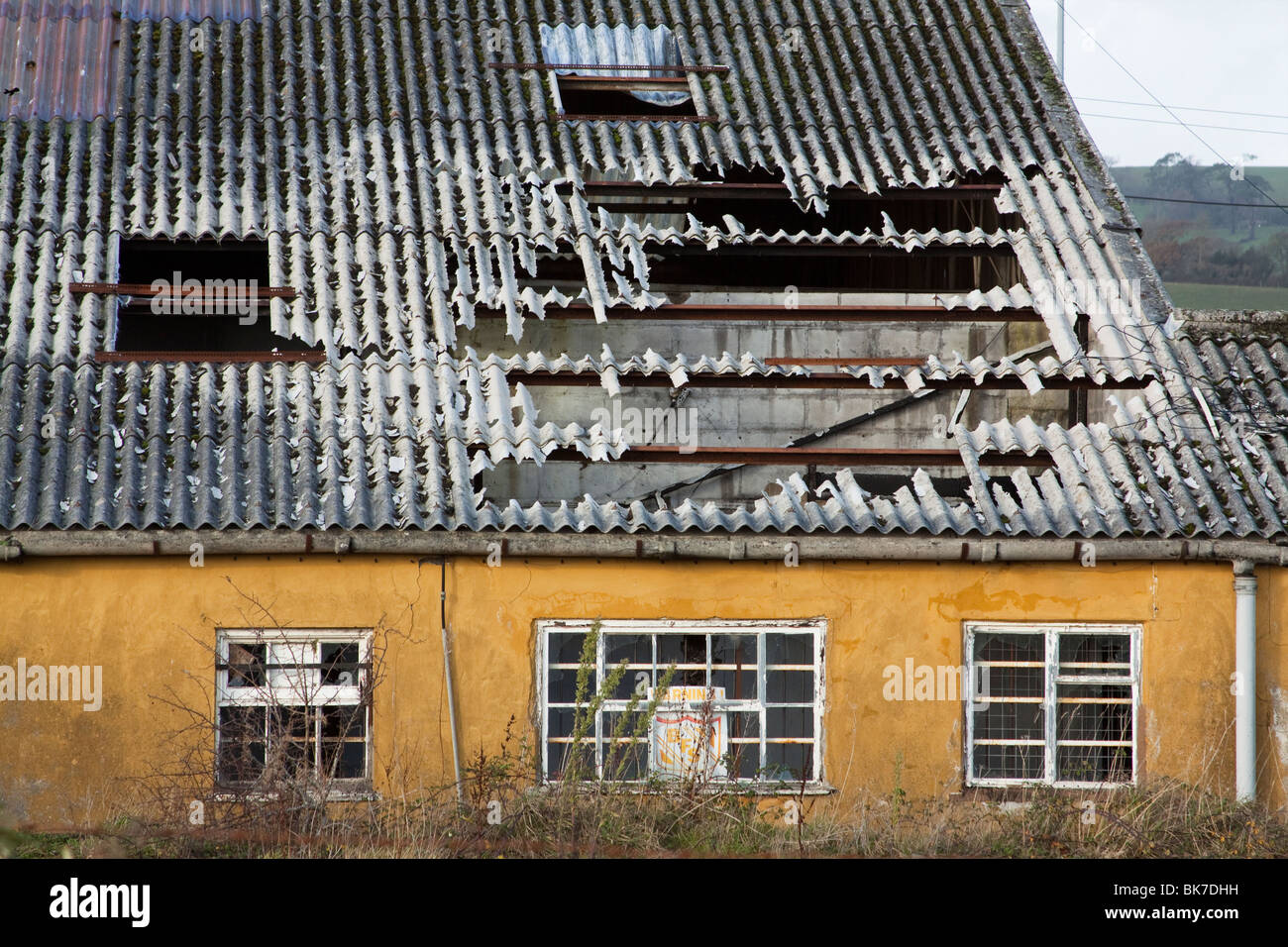 A fire damaged building with a hole in the roof Stock Photo - Alamy