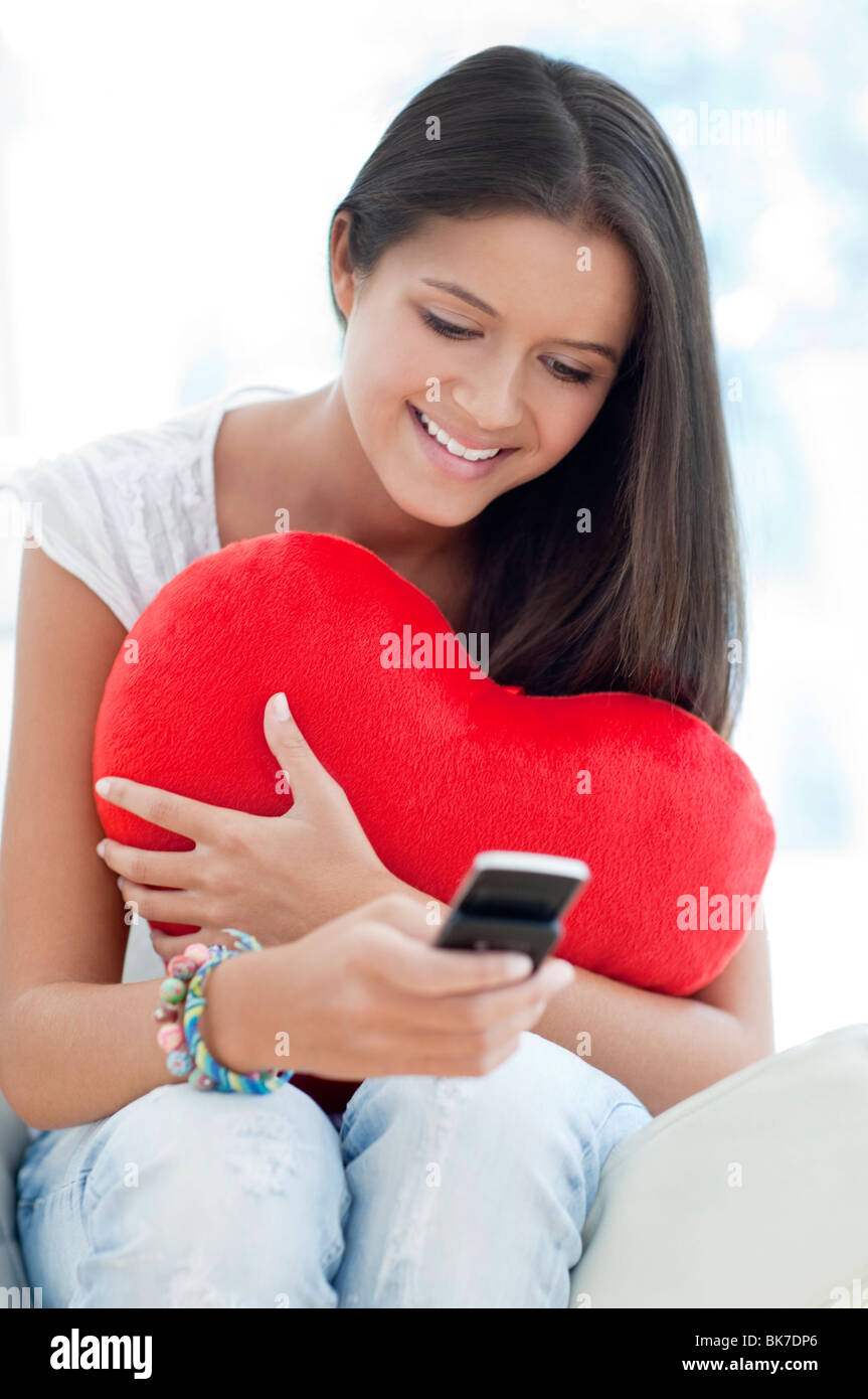 Teenage girl texting Stock Photo - Alamy