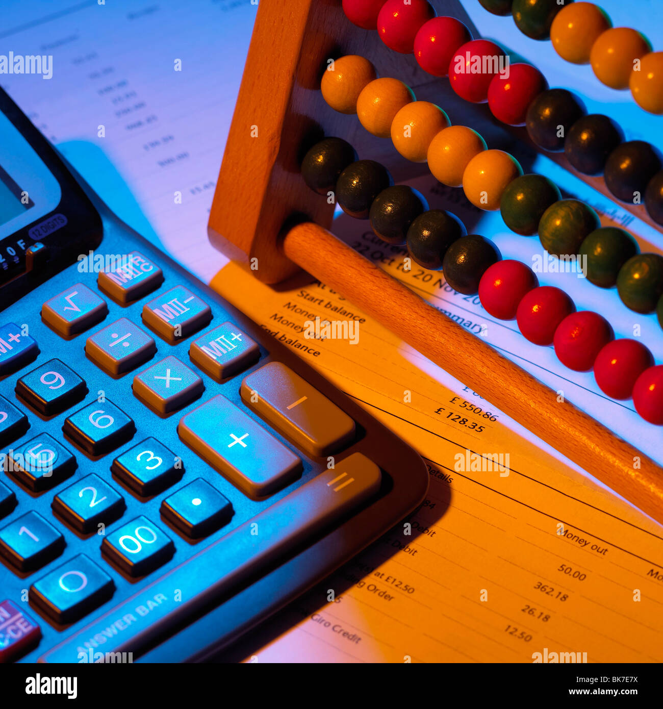 Abacus and calculator Stock Photo - Alamy