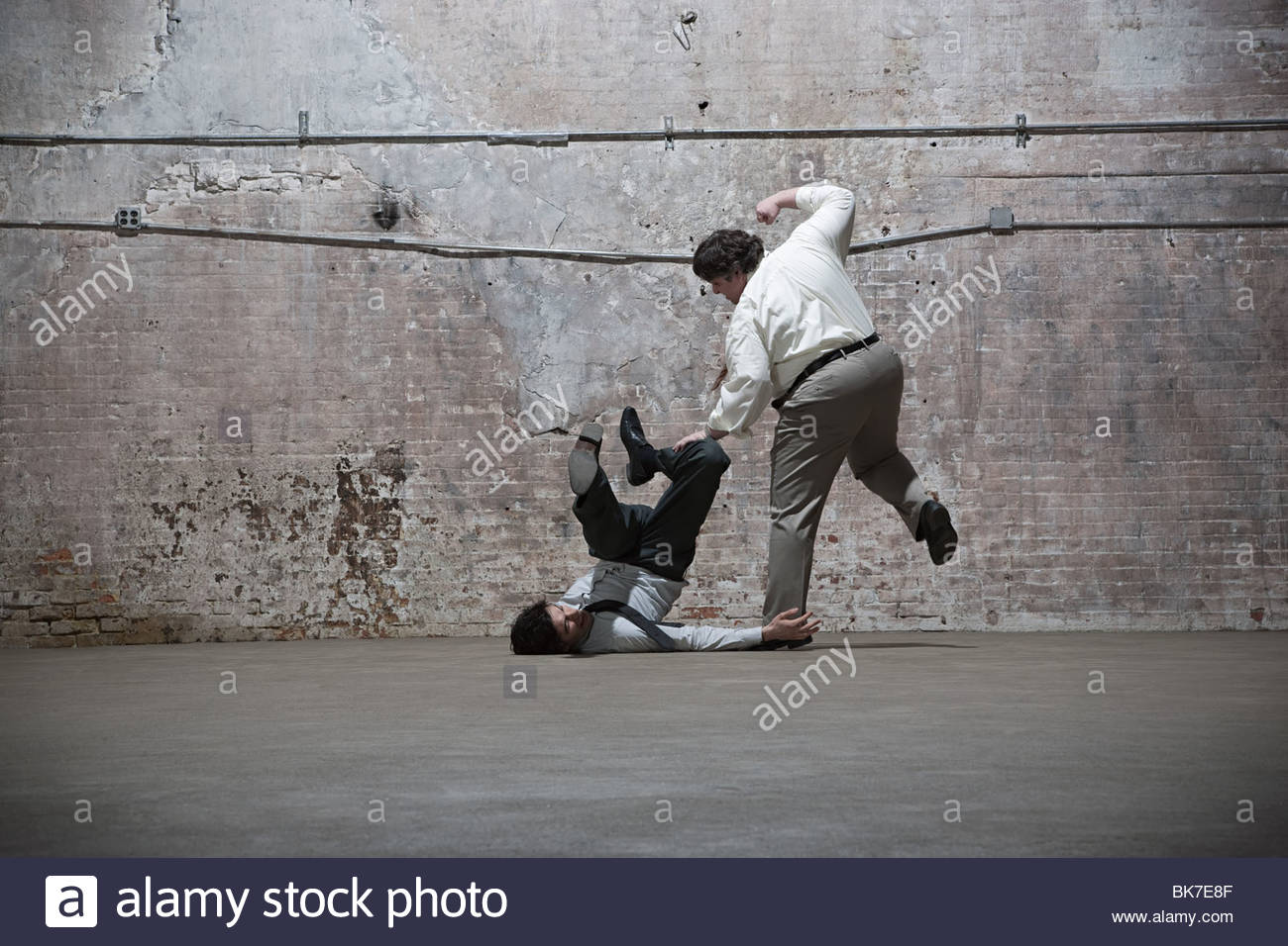 Two Men Fighting Punching Not Boxing Stock Photos & Two Men Fighting ...