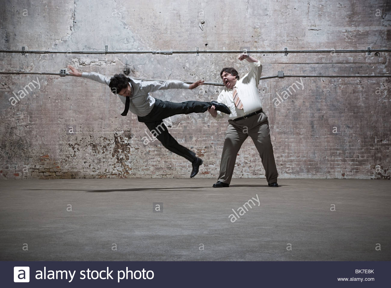 Two Men Fighting Punching Not Boxing Stock Photos & Two Men Fighting ...