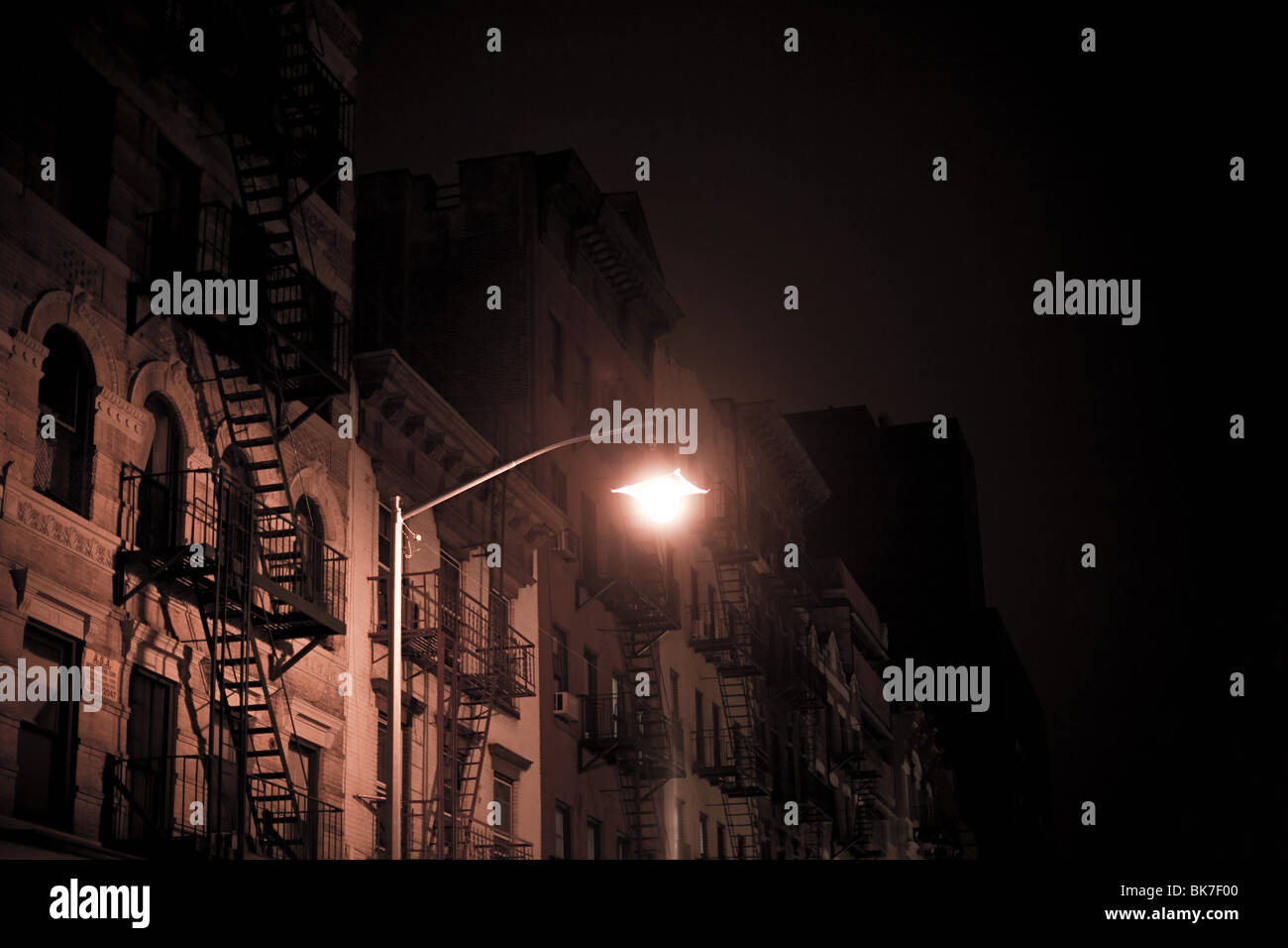 Buildings and streetlight at night Stock Photo - Alamy