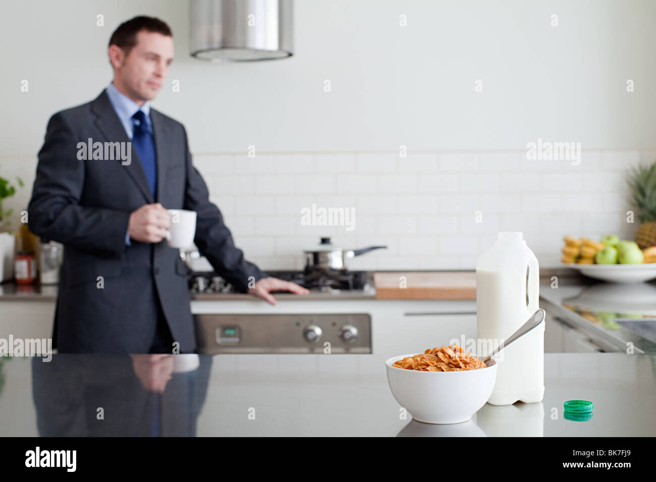 Business man at home suit breakfast hi-res stock photography and images ...