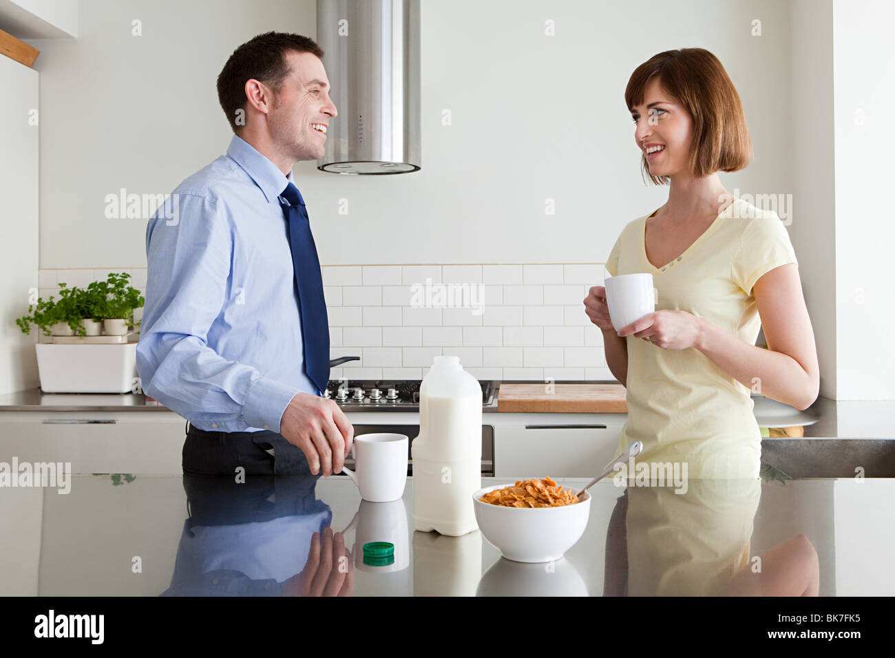 Couple having breakfast Stock Photo - Alamy