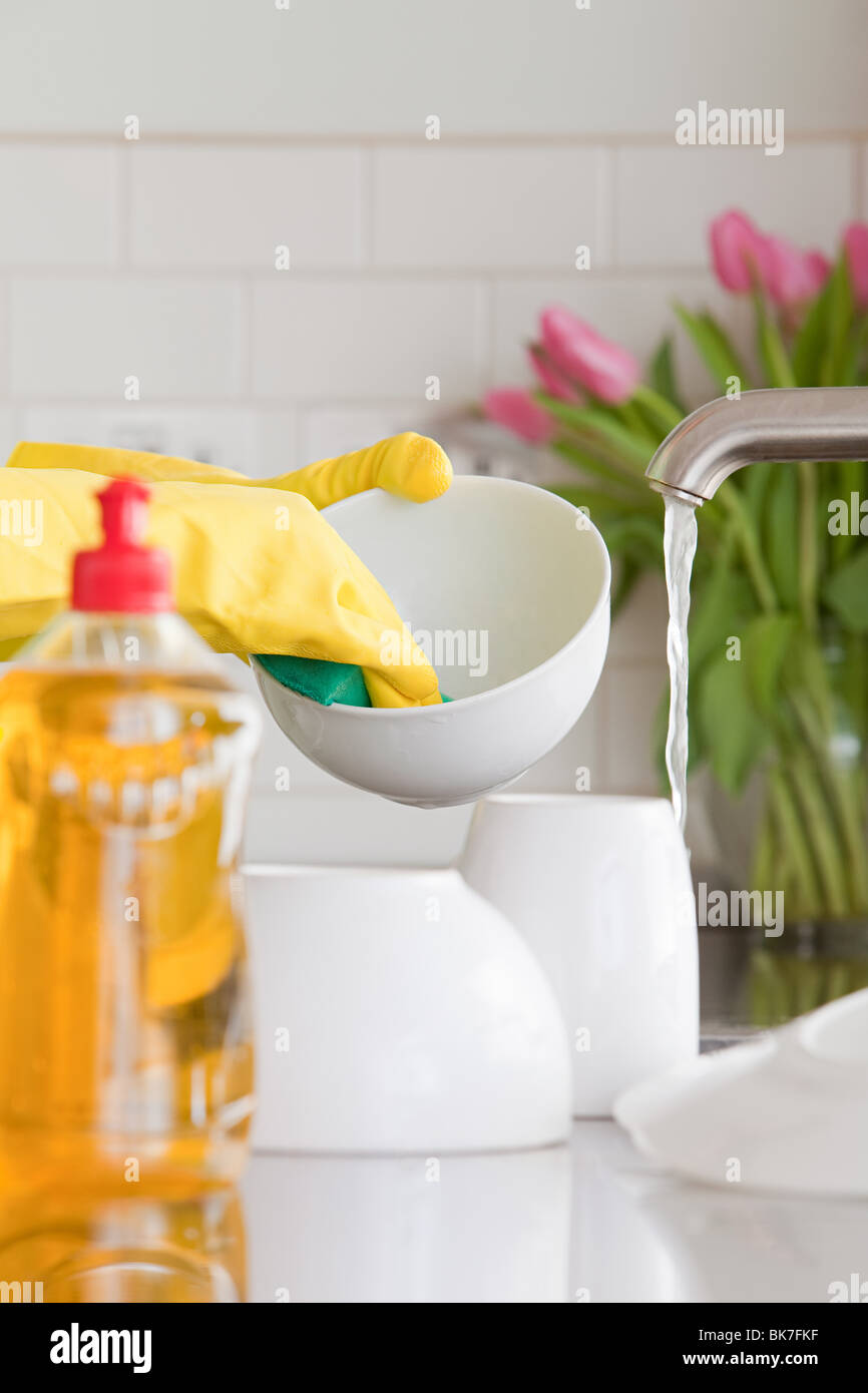 Person washing up Stock Photo - Alamy