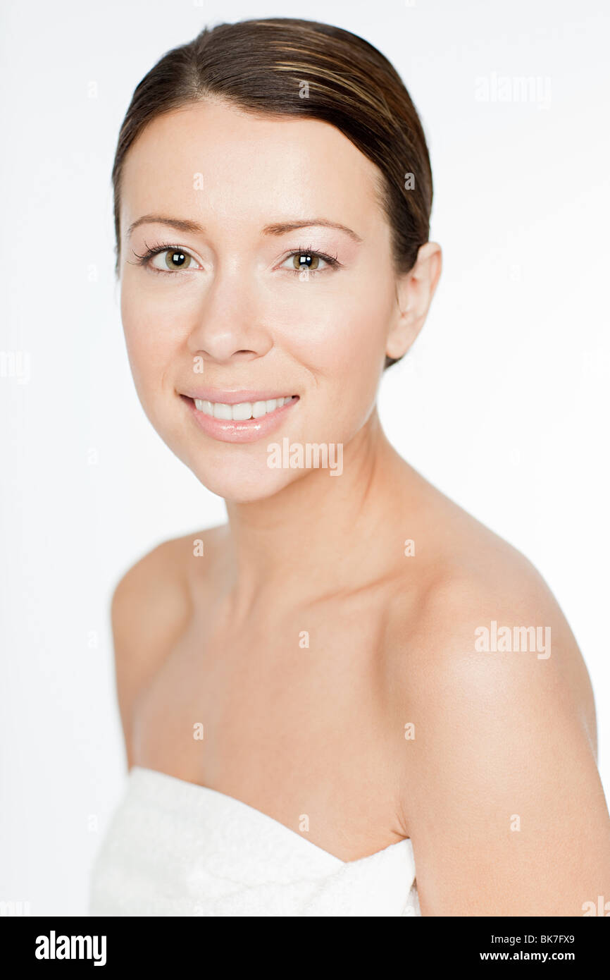 Young woman wearing towel Stock Photo - Alamy