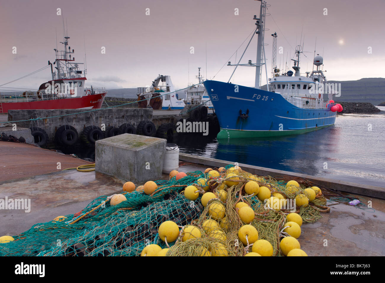 Trawler and fishing nets in Toftir harbour, Toftir, Eysturoy, Faroe ...