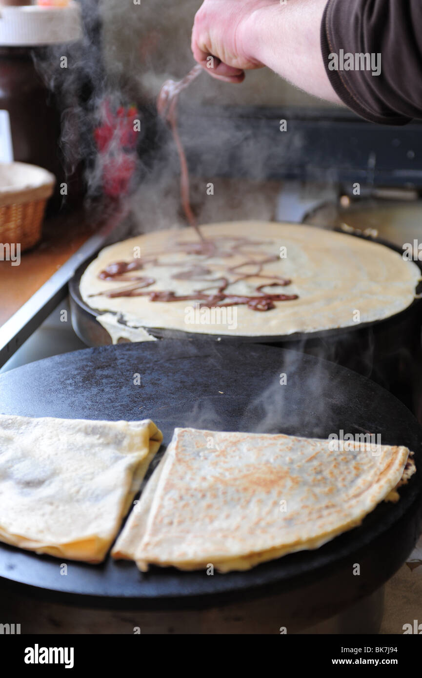 France Paris Montmartre crepe making at creperie nutella hot food ...