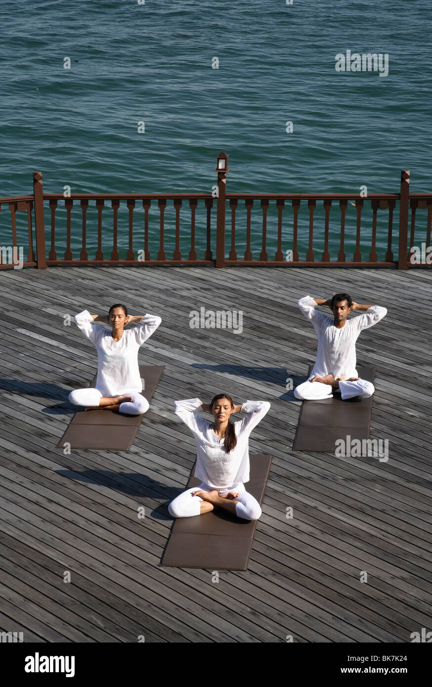 Woman Yoga Sea Sit High Resolution Stock Photography and Images - Alamy