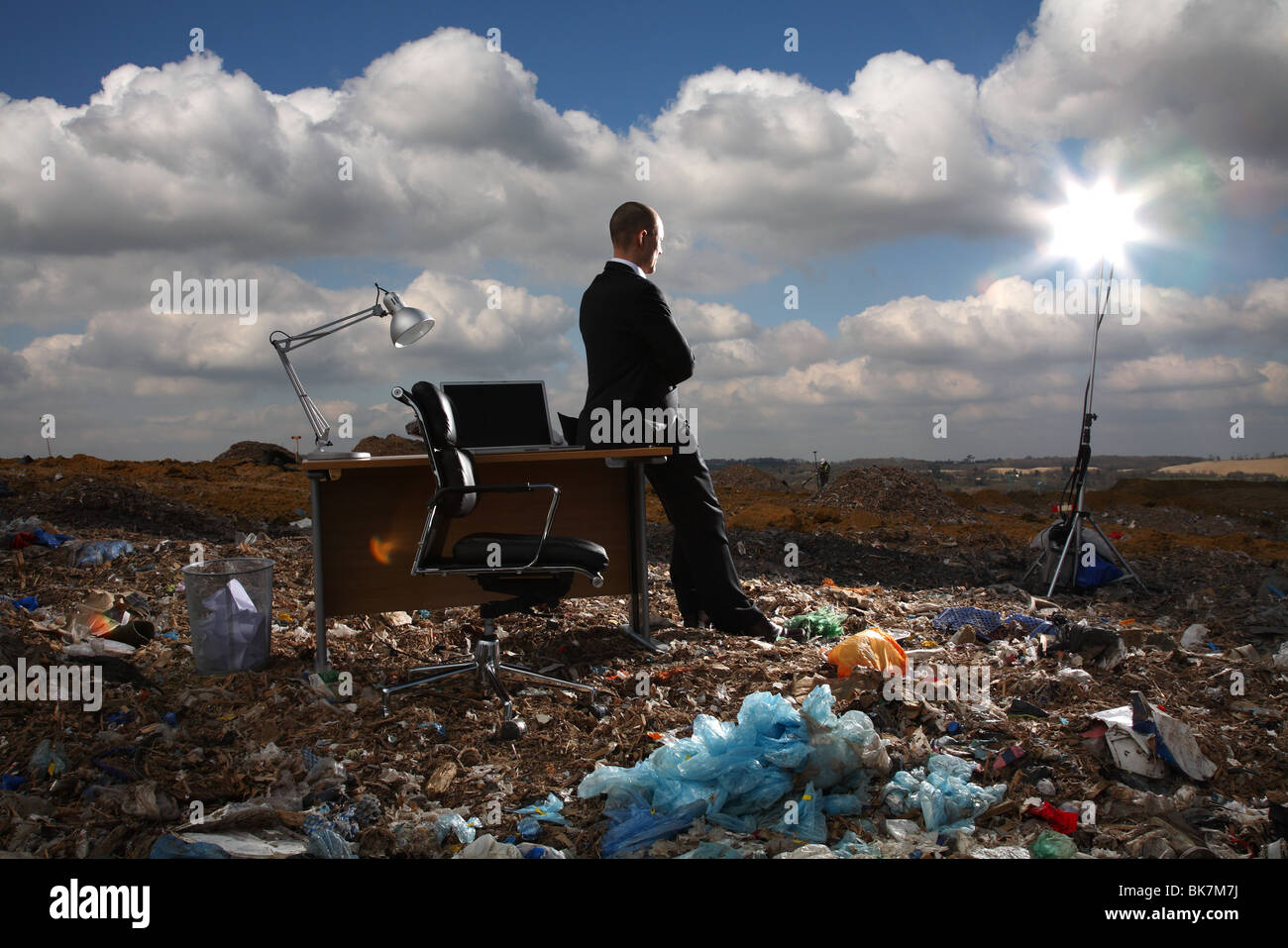 Office worker at desk at British landfill site Stock Photo - Alamy