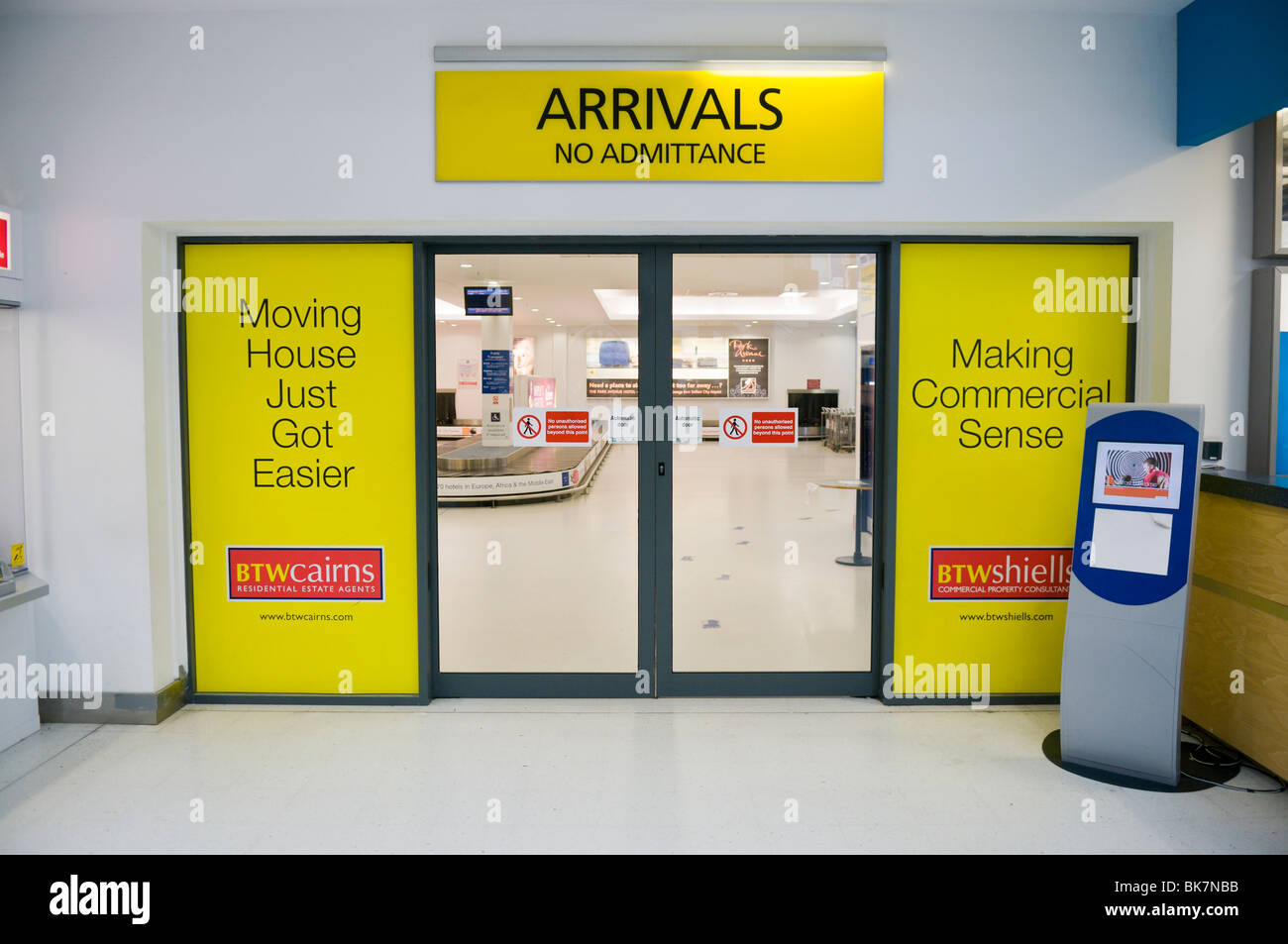 Exit of arrivals lounge at an airport Stock Photo - Alamy