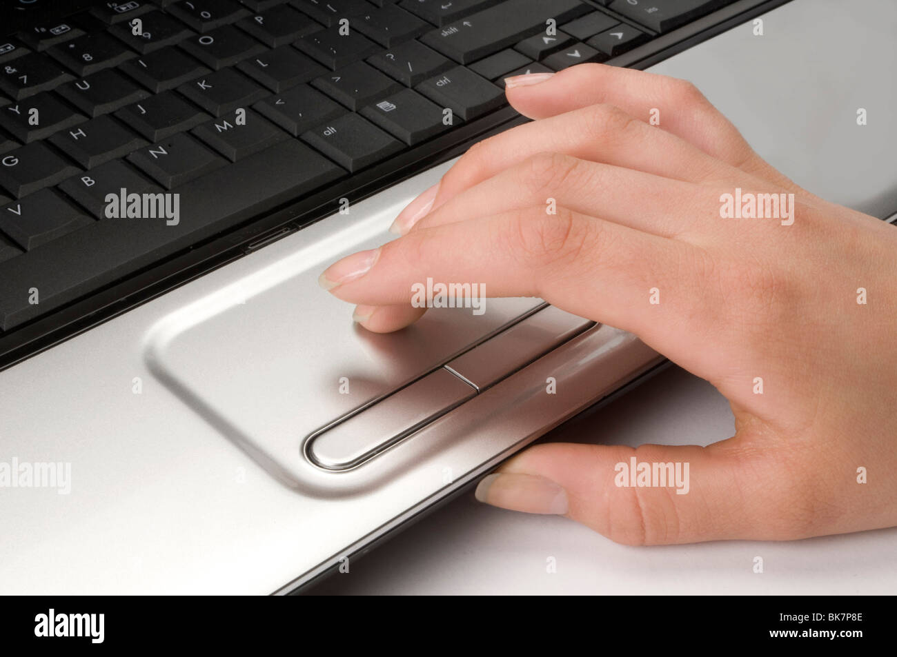 Woman fingers tapping touchpad laptop hi-res stock photography and ...