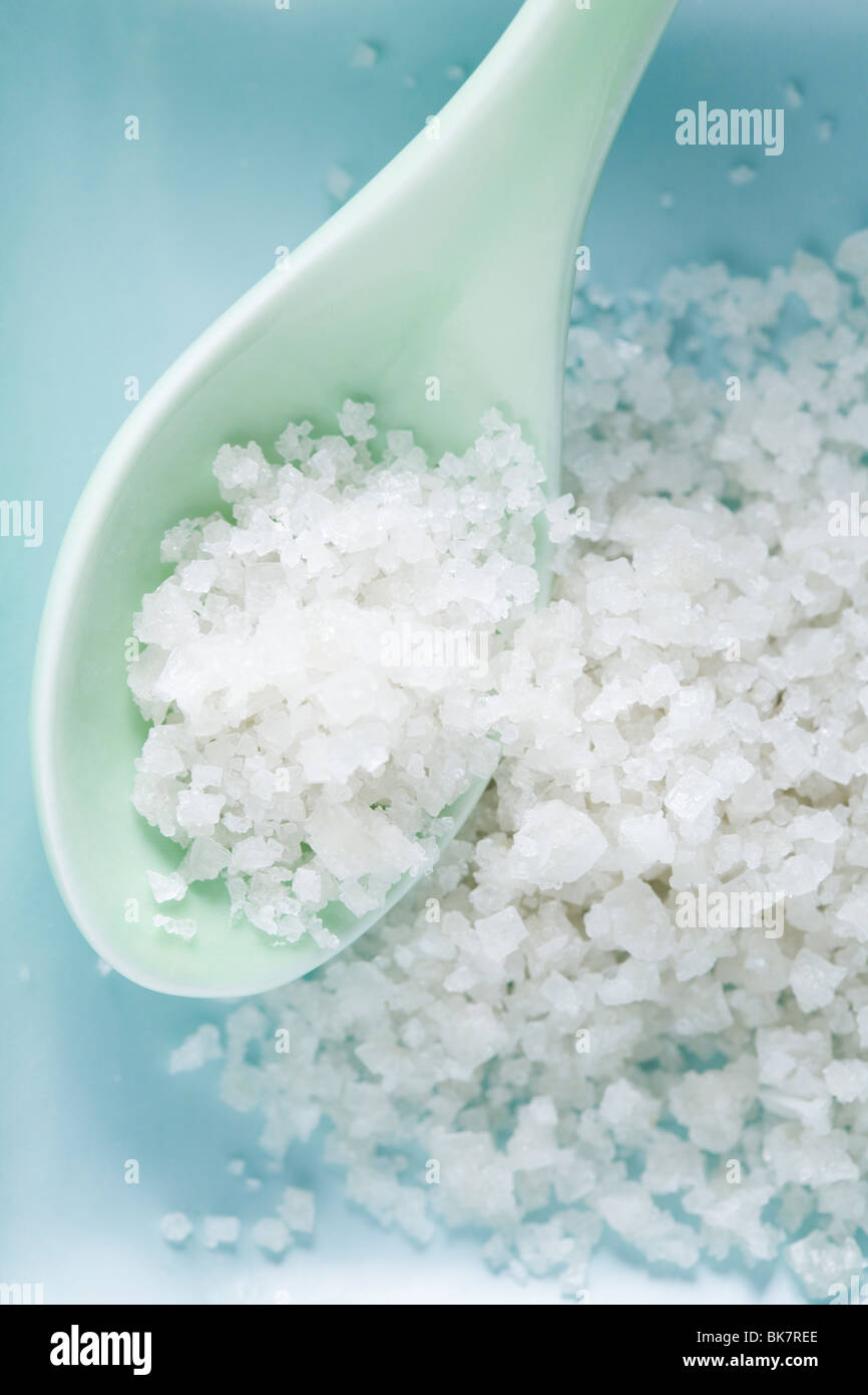 Spoon with sea salt Stock Photo - Alamy