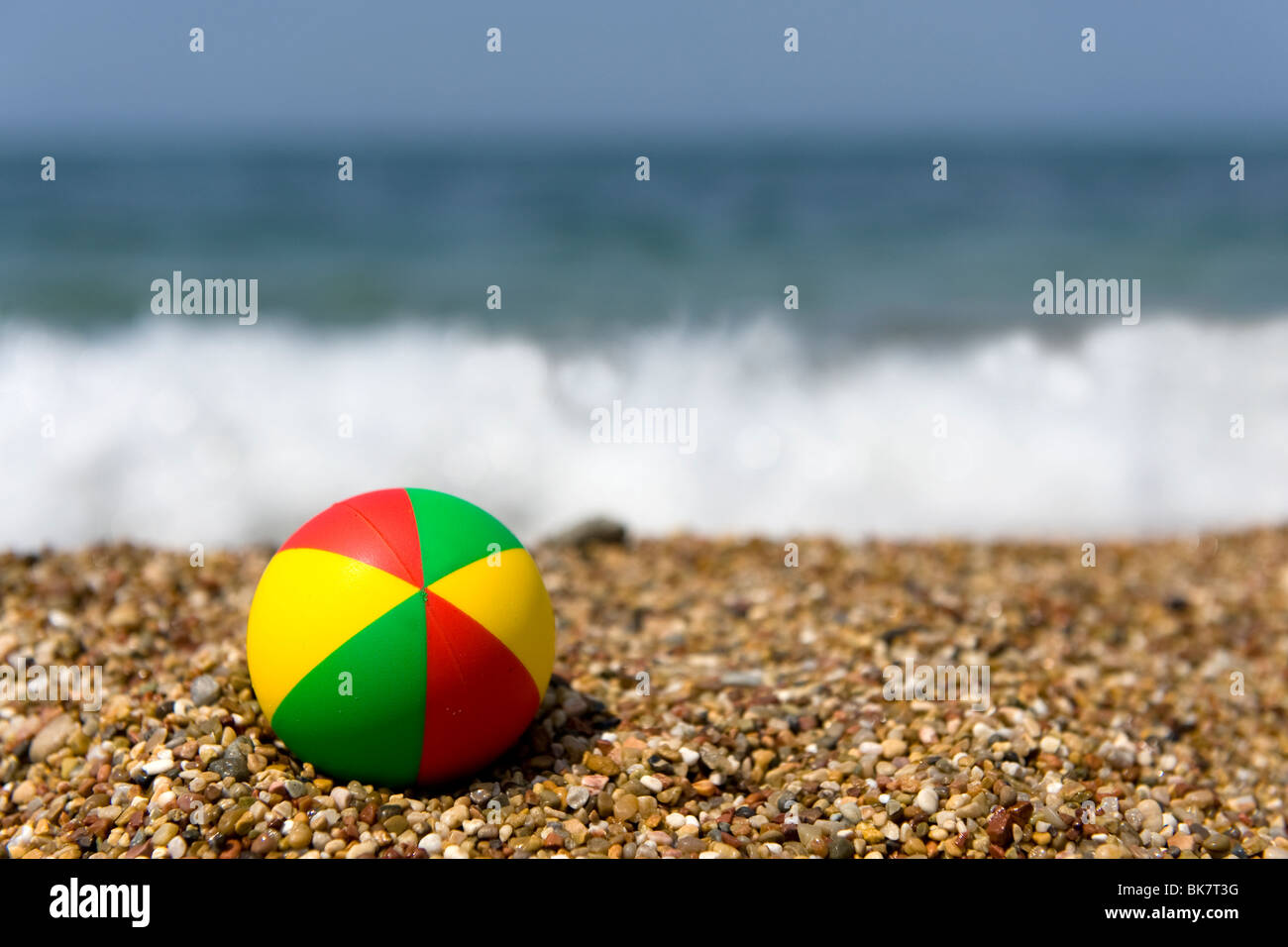 colorful beach ball on nature coast landscape Stock Photo - Alamy