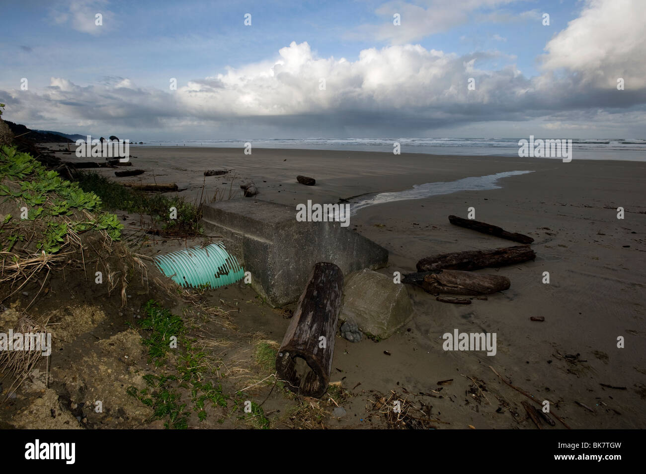 Storm drain outlet emptying out to the Pacific Ocean Stock Photo - Alamy