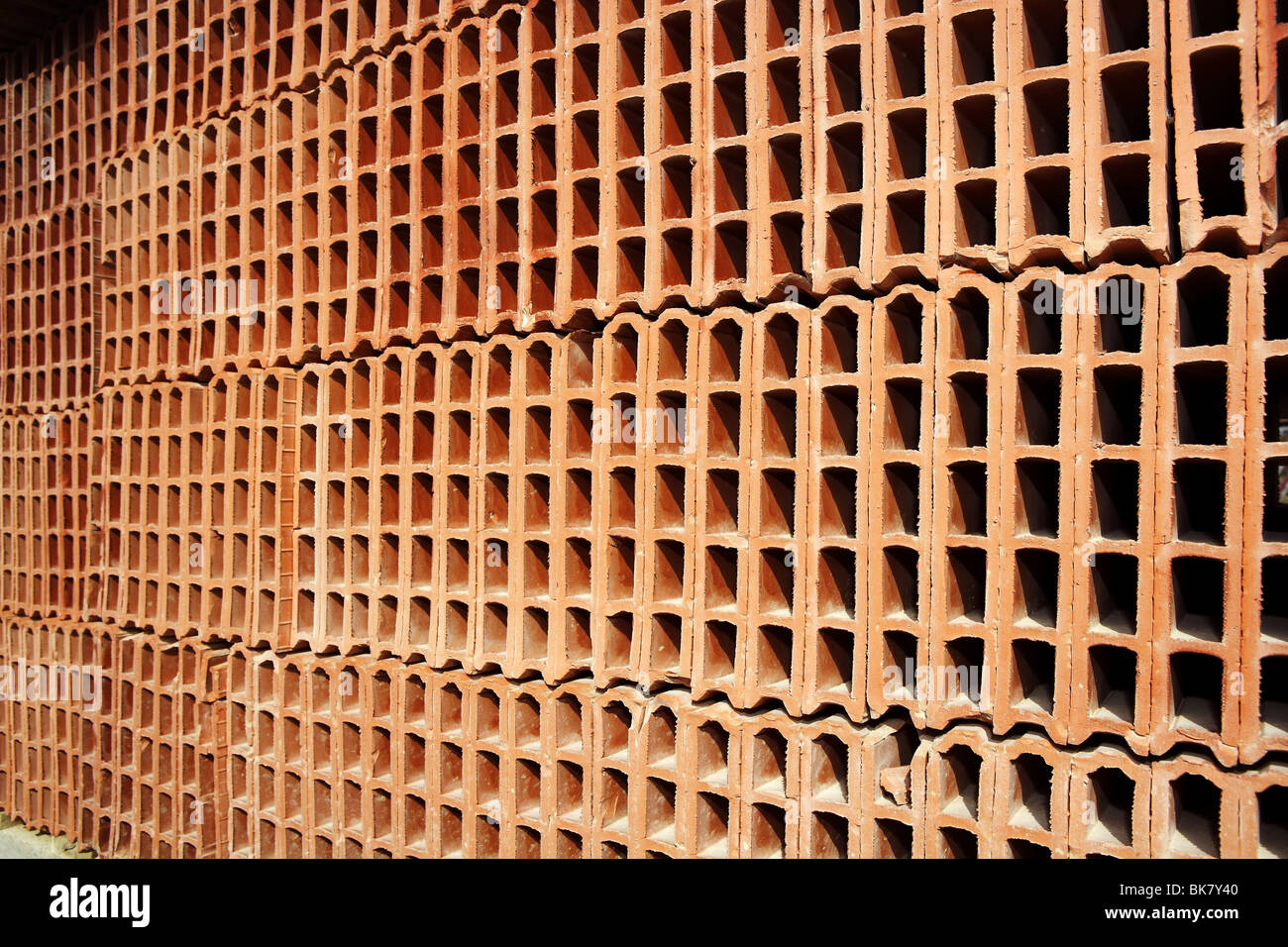 construction bricks stacked pattern red clay Stock Photo - Alamy