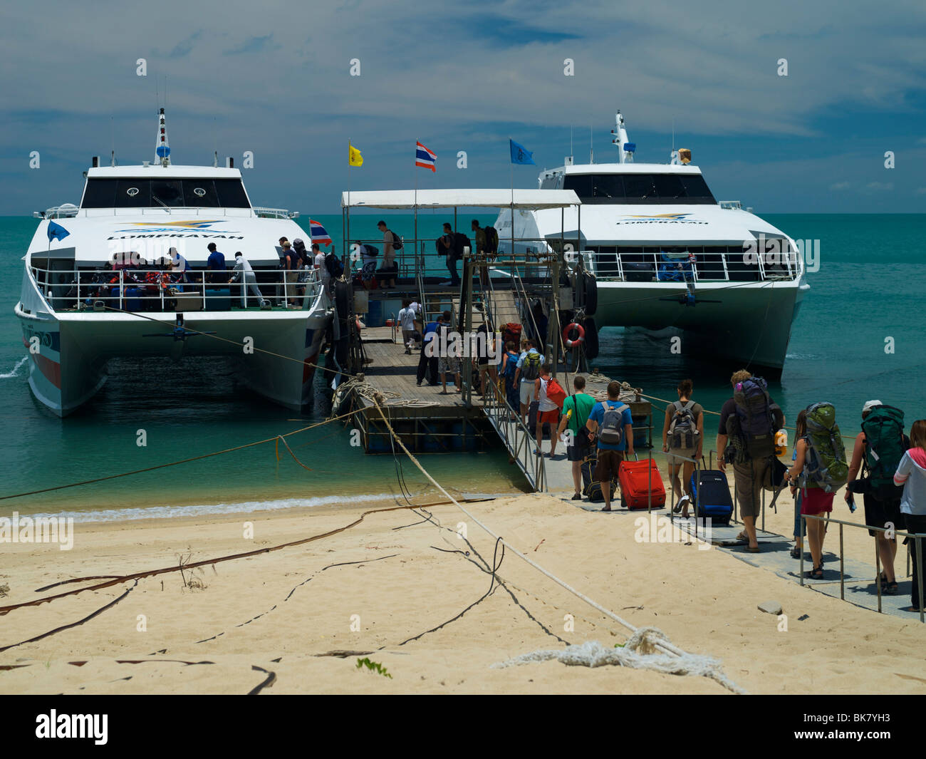 Tourists boarding the fast catamaran ferry in Koh Samui Thailand Stock ...