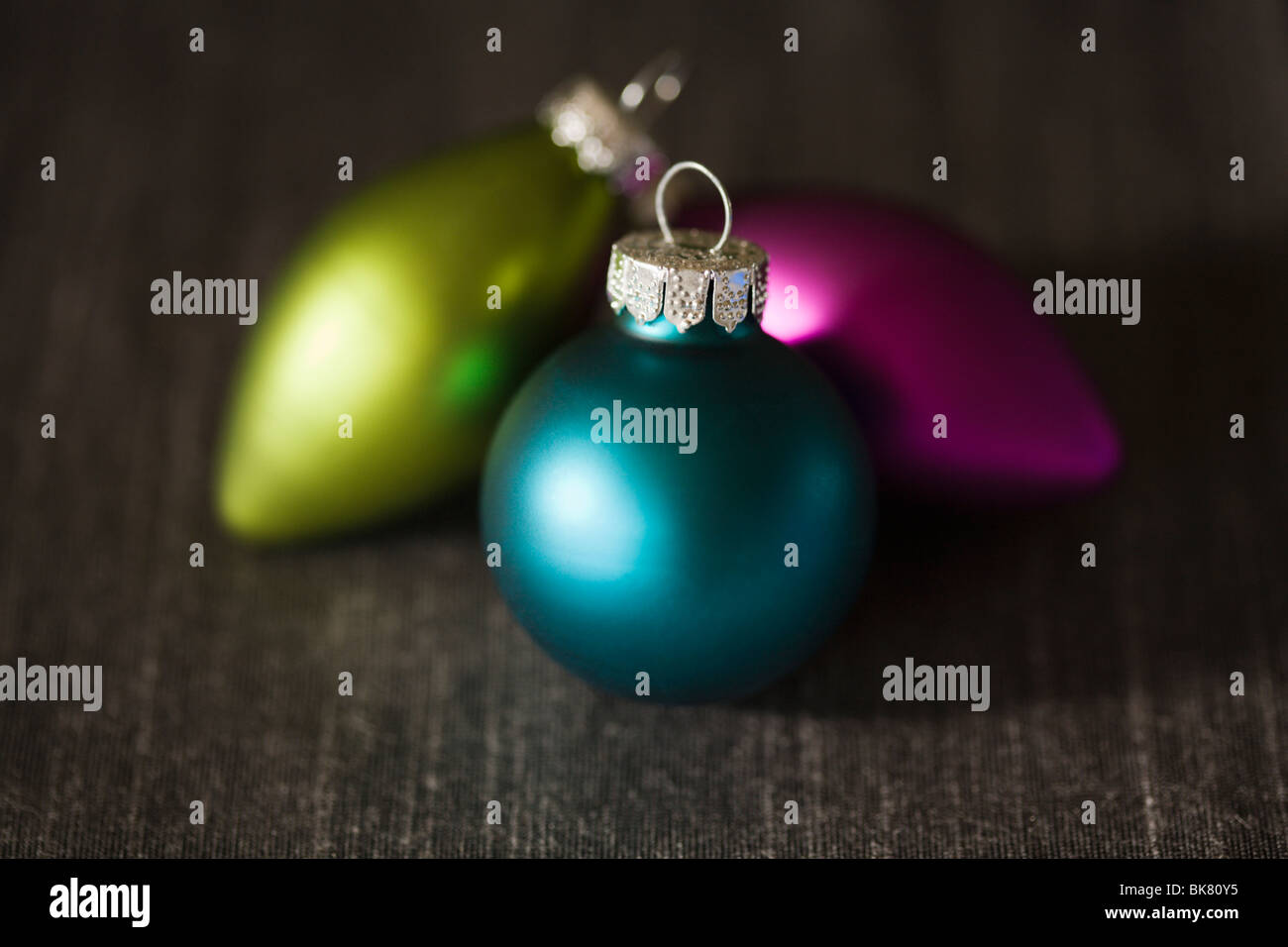 Three Christmas baubles Stock Photo - Alamy