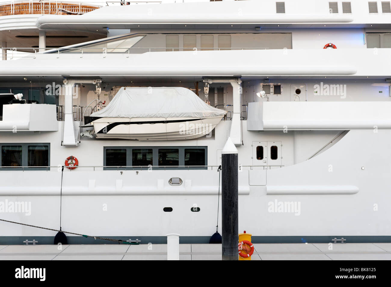 The side of a superyacht Stock Photo - Alamy