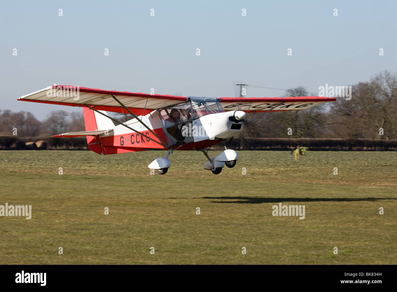 Skyranger 912 (2) G-CCKG micolight aircraft in flight taking-off from ...