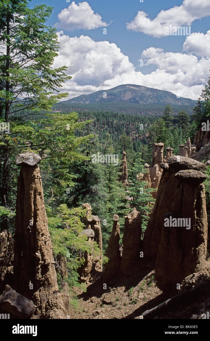 Hoodoos Formed By Erosion Around Rocks Form Foreground For Redondo Peak ...