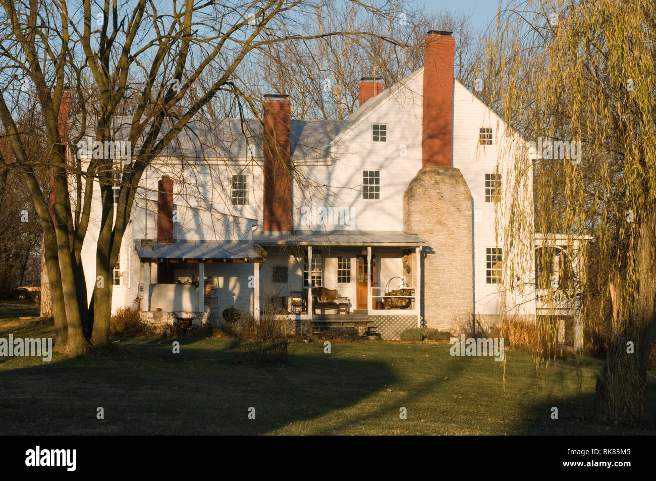 Virginia farmhouse in the autumn light featuring three chimneys and two ...