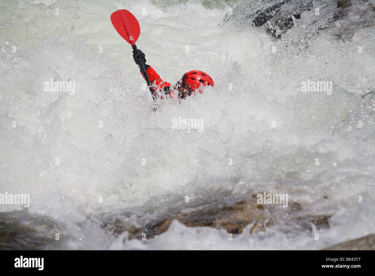 MAN IN BLUE DAGGER KAYAK CRASHING UNDER WATER SHOOTING THE BULL SLUICE ...