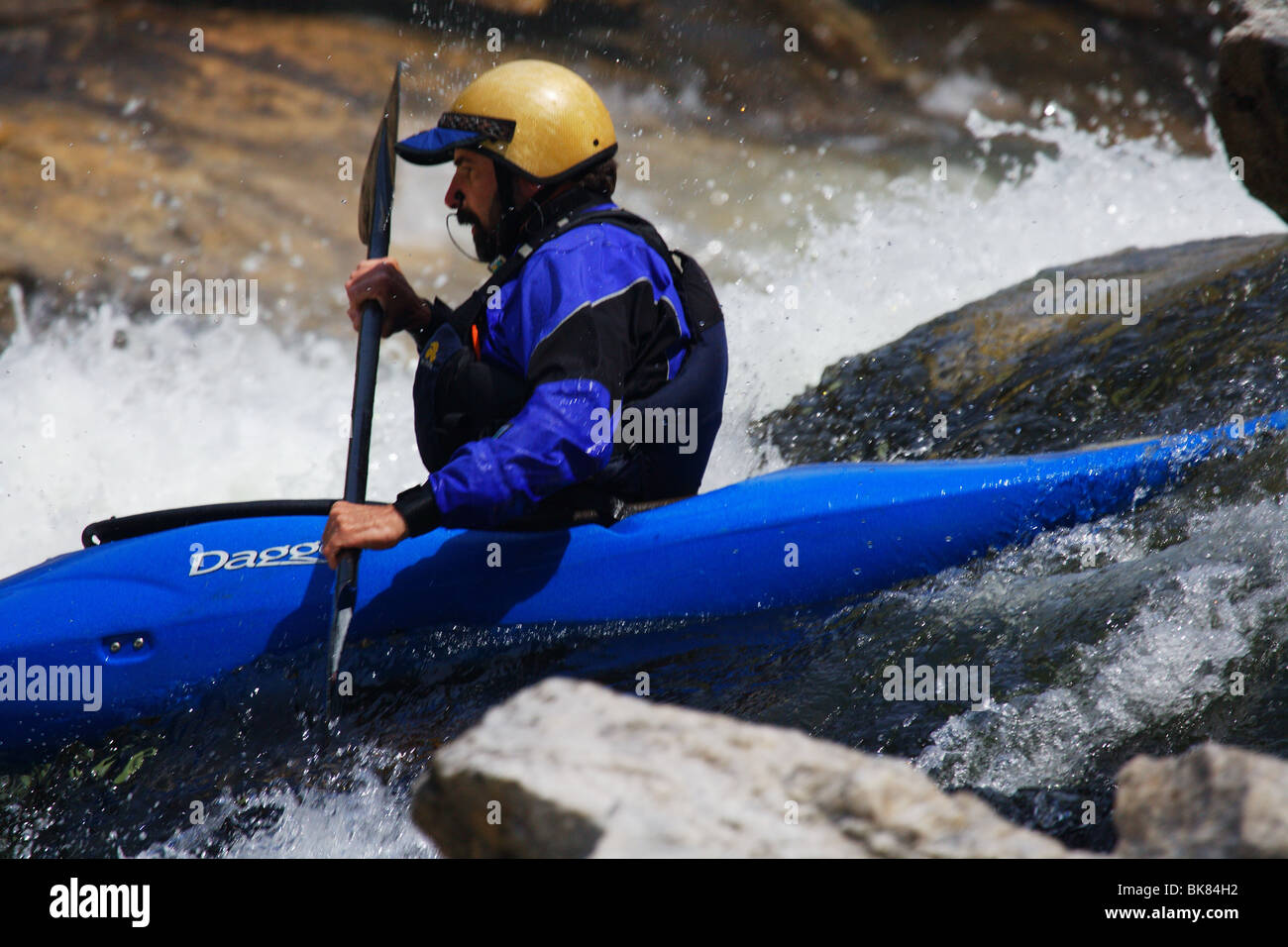 MAN IN BLUE DAGGER KAYAK CRASHING INTO THE WATER BULL SLUICE RAPIDS ...