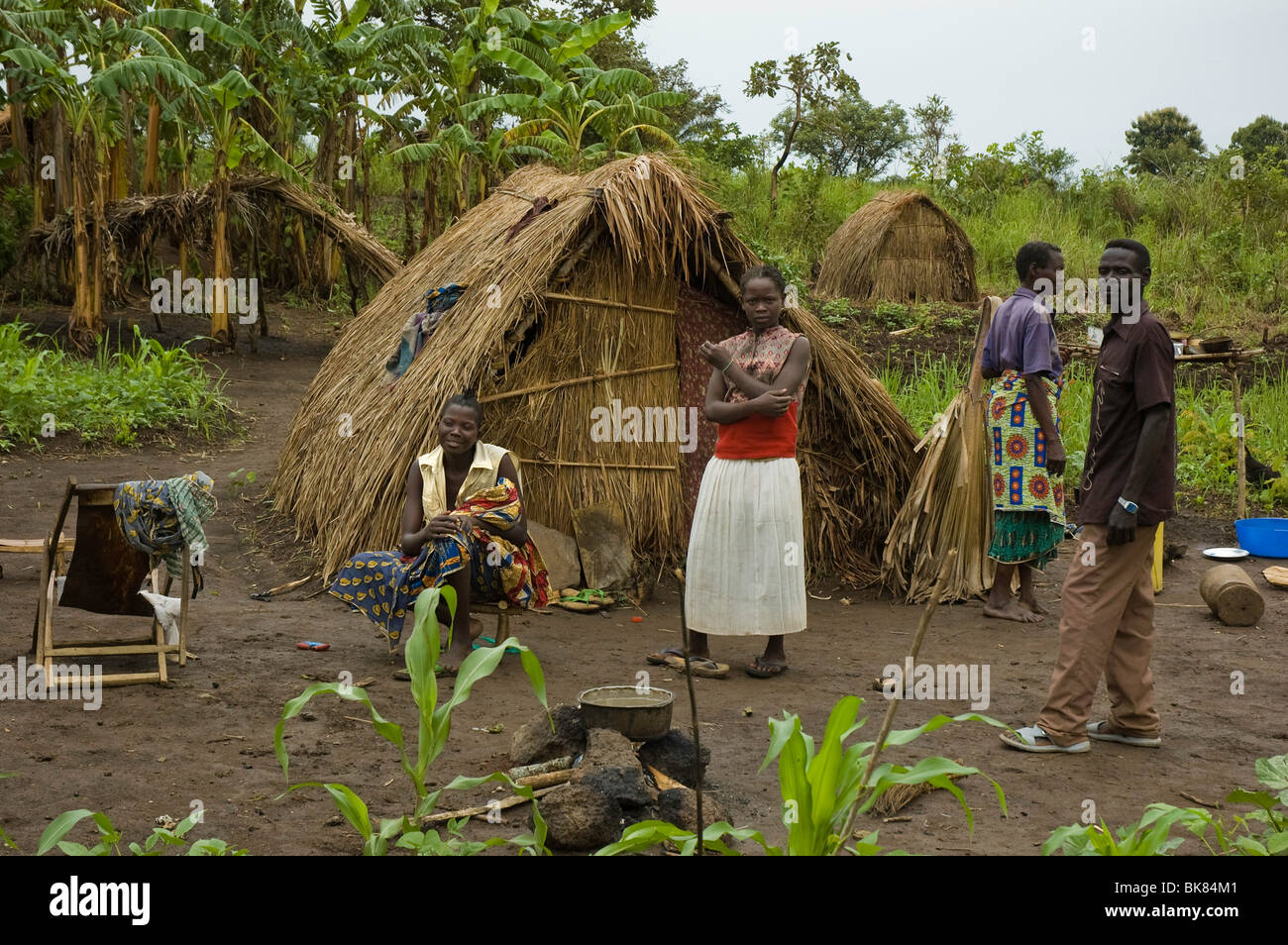 African man and hut hi-res stock photography and images - Alamy