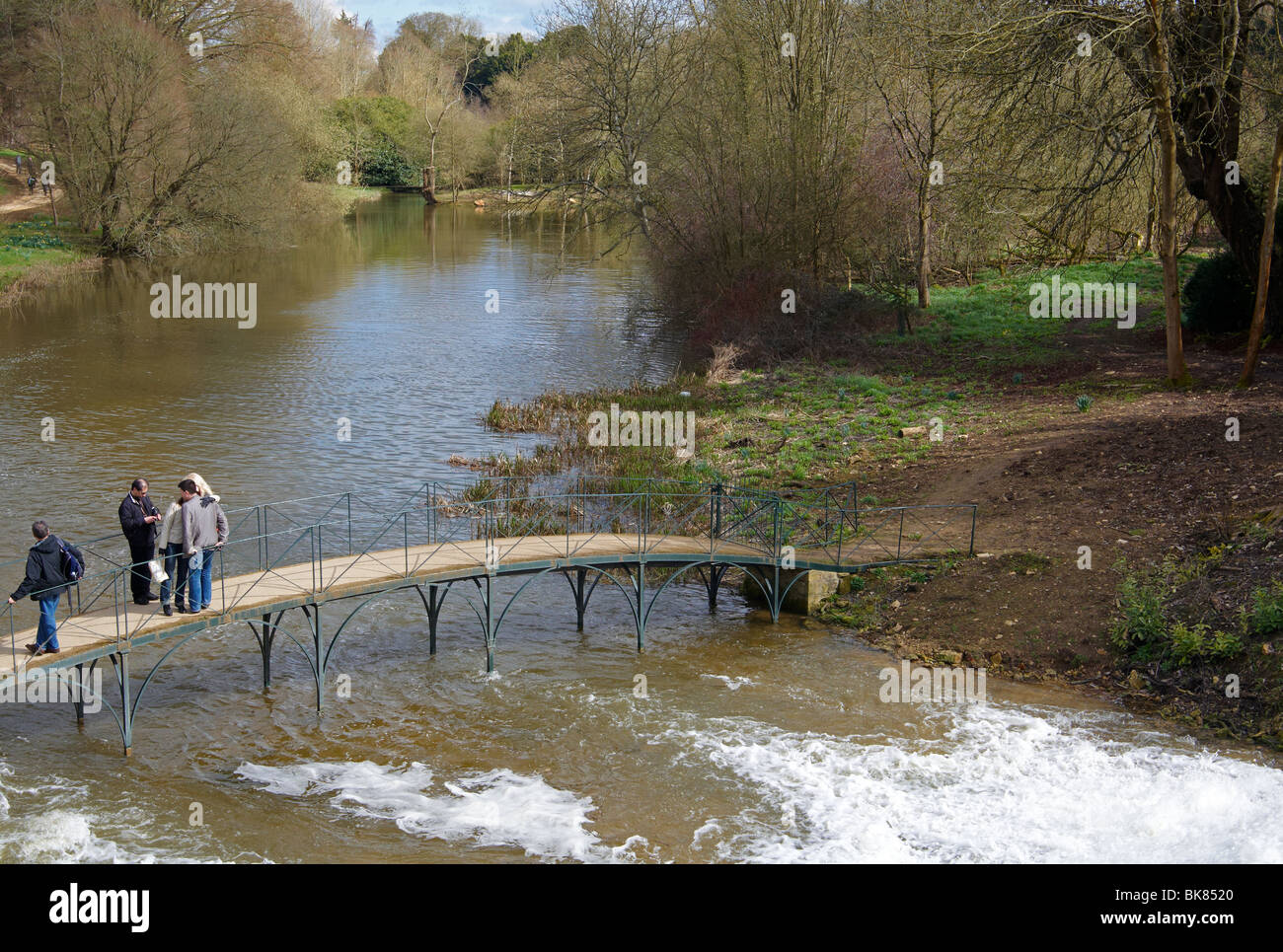 River Glyme and bridge below the cascade in the park at Blenheim Palace ...