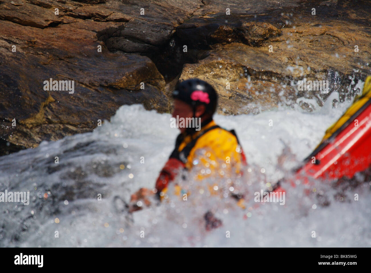 MAN IN YELLOW PYRANHA KAYAK SHOOTING THROUGH BULL SLUICE RAPIDS ...