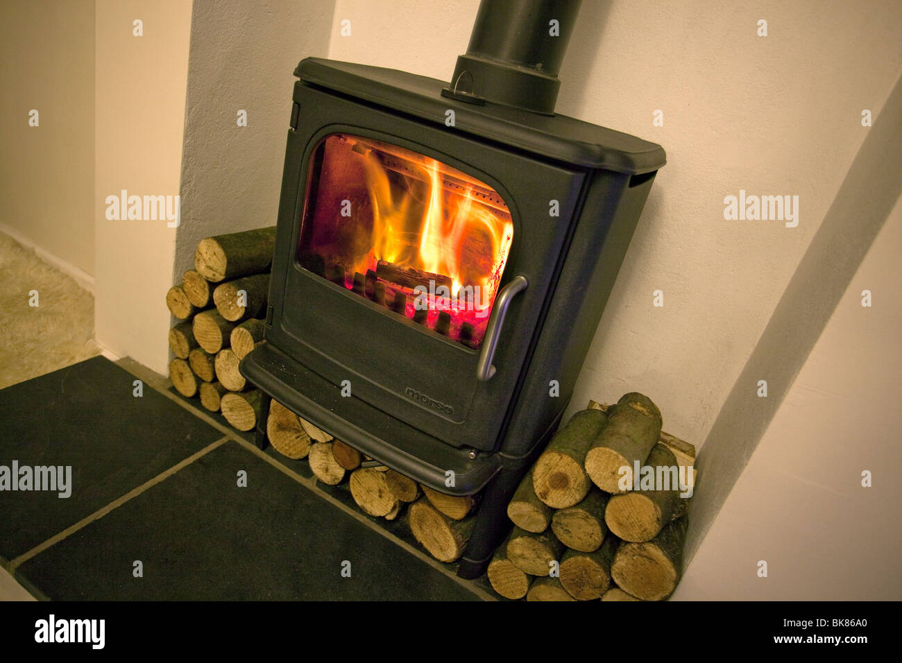 morso owl multi fuel burner on slate hearth Stock Photo - Alamy