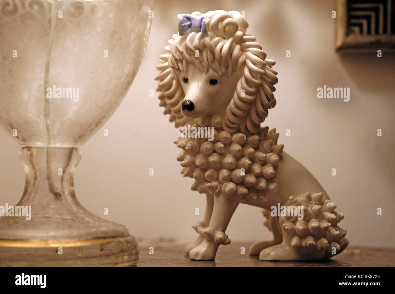 Porcelain poodle, seated, old hand-made porcelain figure from around ...