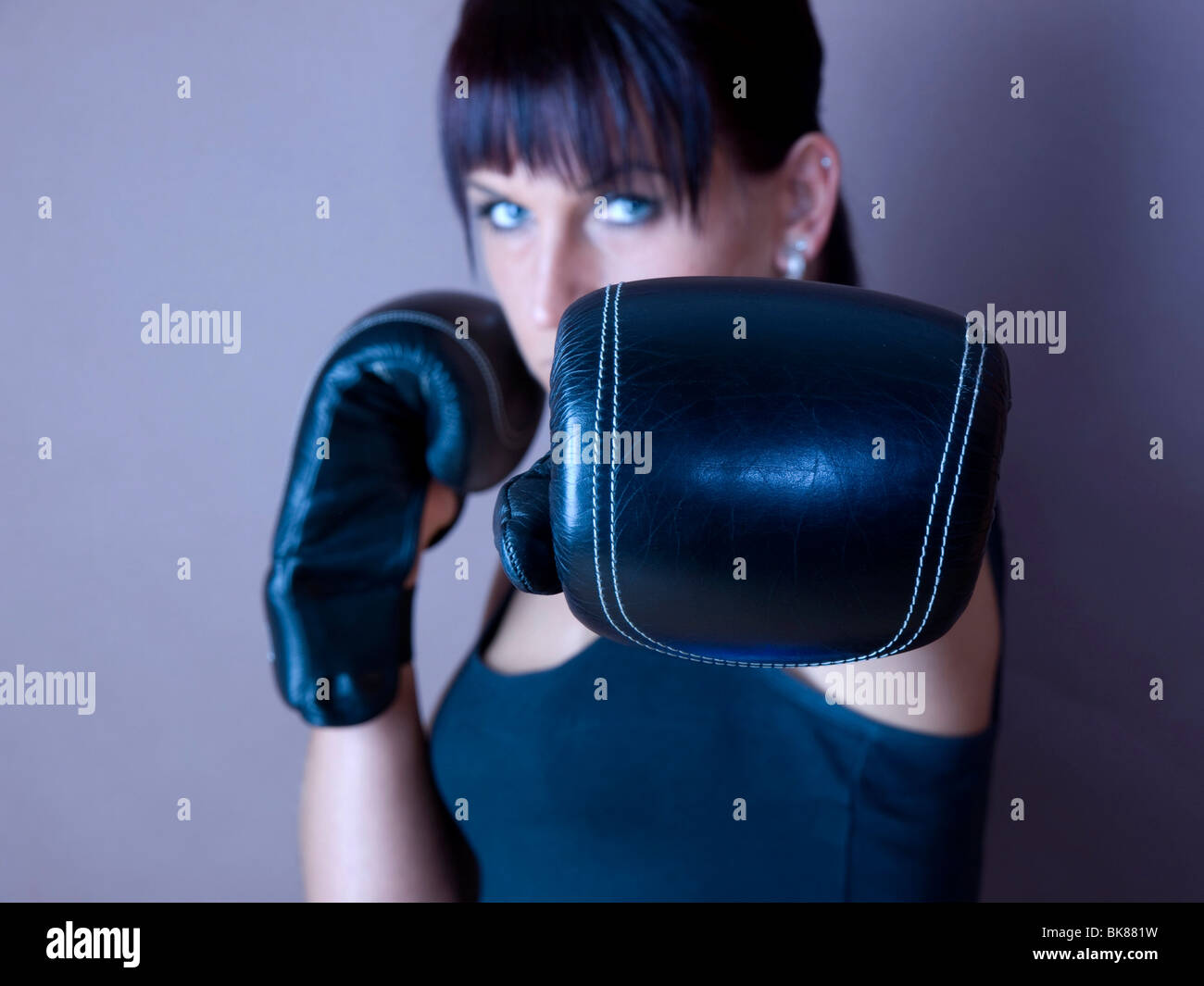 Woman, athlete, boxer with an outstretched fist Stock Photo - Alamy