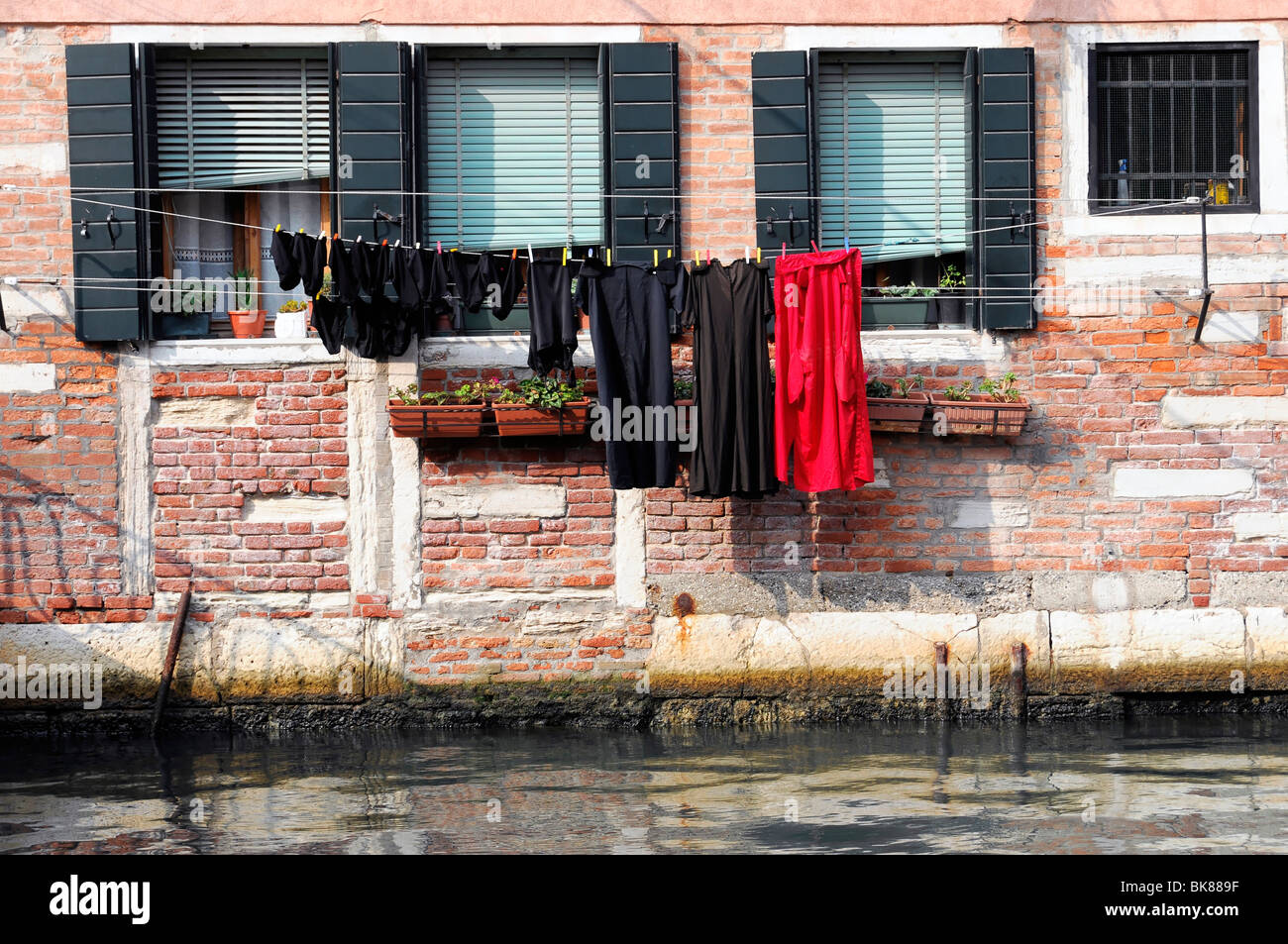 Clotheslines in front of a window hi-res stock photography and images ...