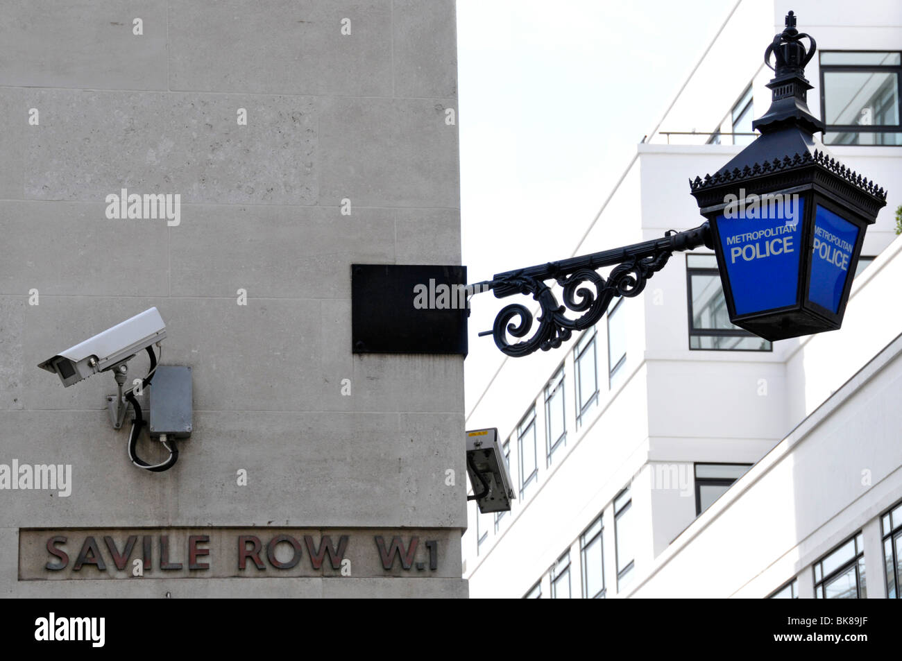 CCTV camera mounted on wall of Savile Row police station Stock Photo ...