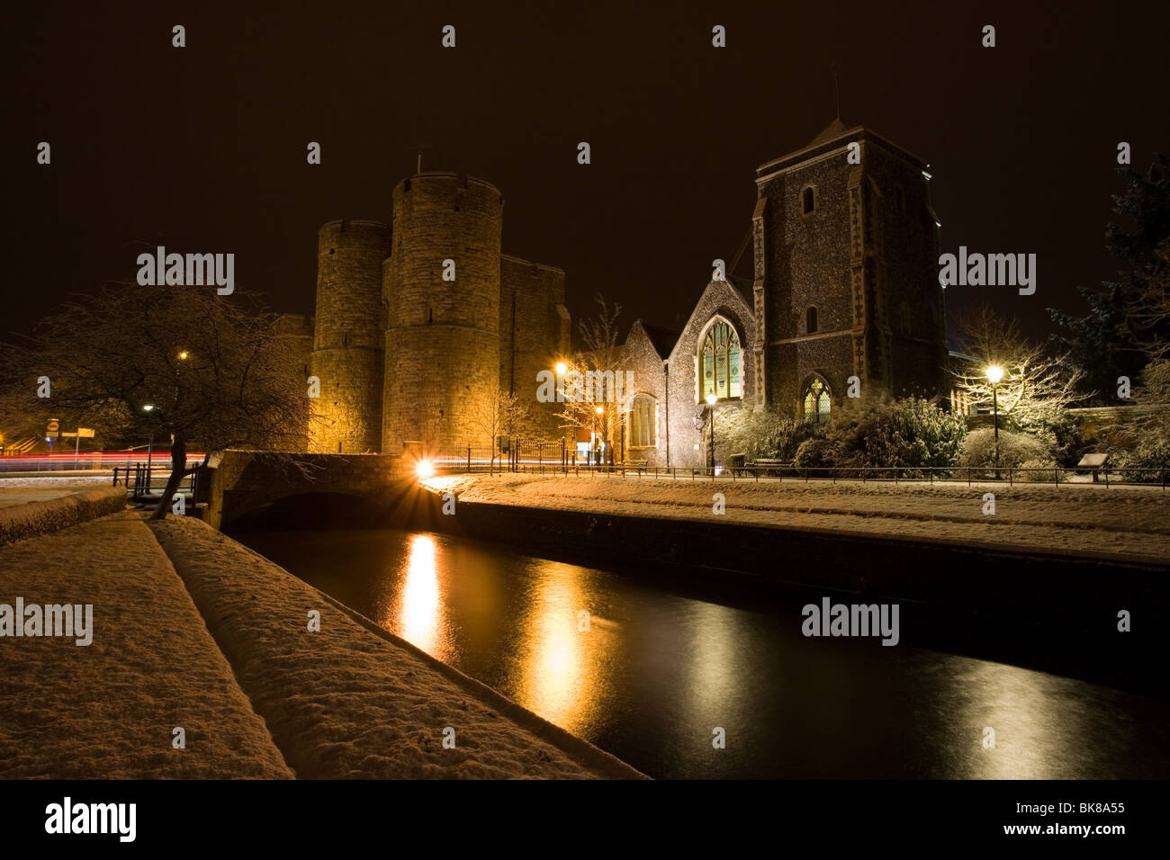 Night view of the Westgate towers covered in snow in Canterbury, Kent ...