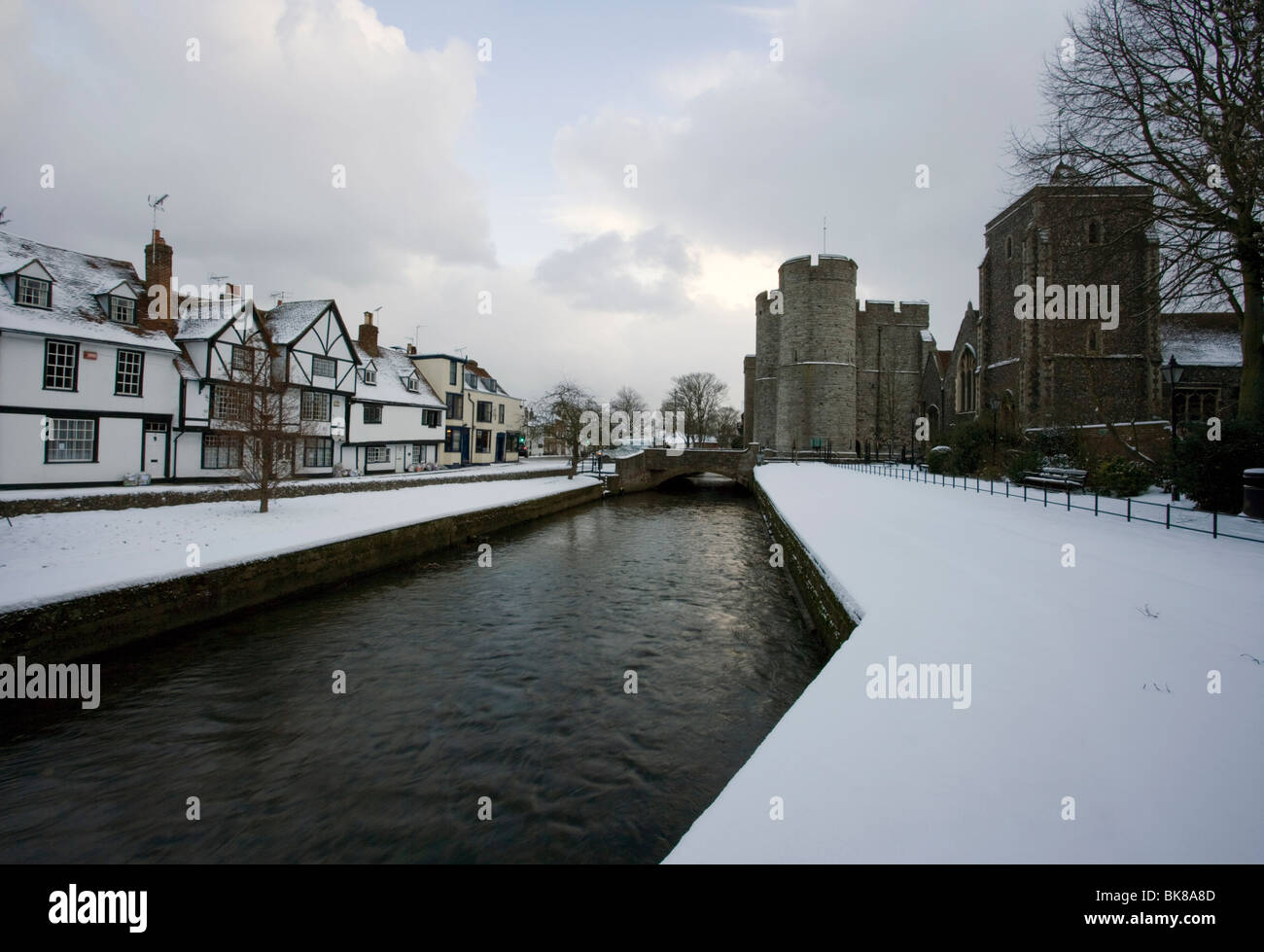 View of the Westgate towers and listed houses covered in snow in ...