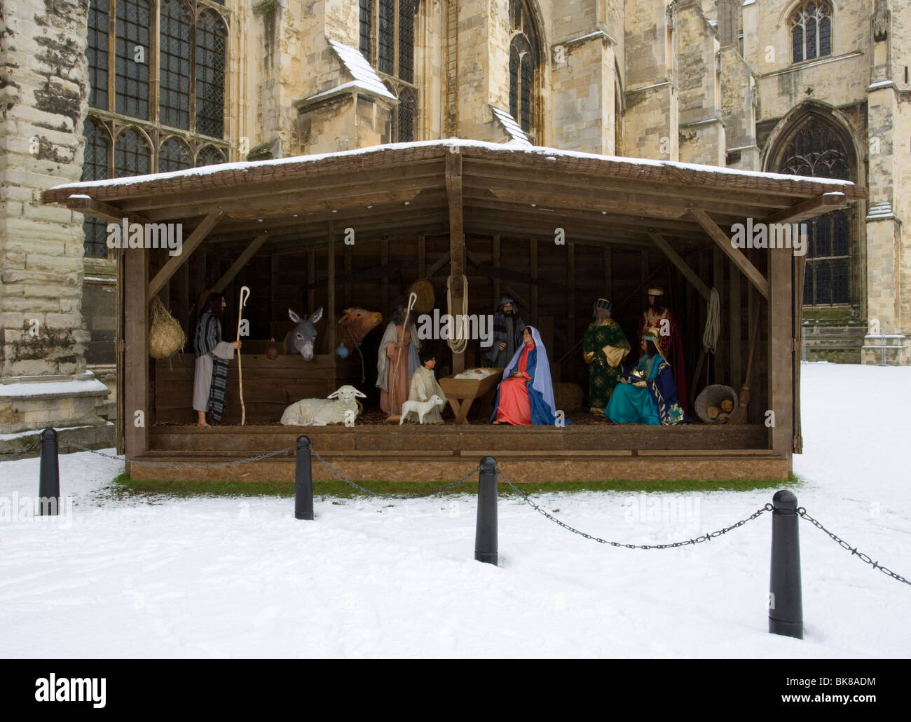 Christmas stall with nativity scene in snow at Canterbury Cathedral in ...