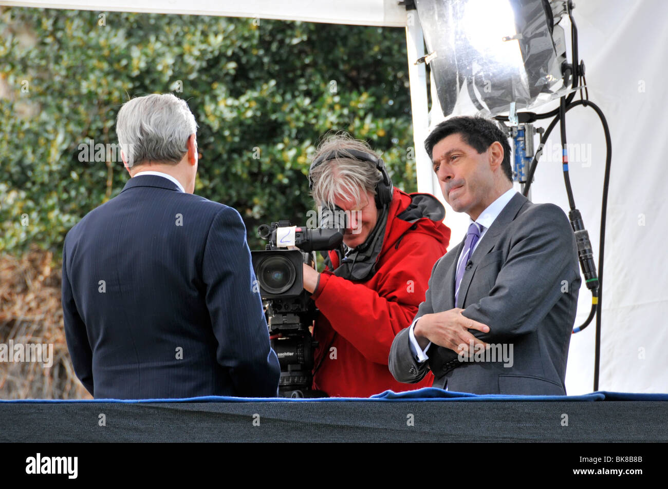 Close up camera operator films BBC presenter Jon John Jonathan Sopel ...